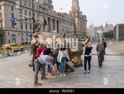 Bronze statue of a bull on the Bund Shanghai China Stock Photo - Alamy