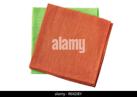 Stack of pale green and red folded napkins isolated on white background ...
