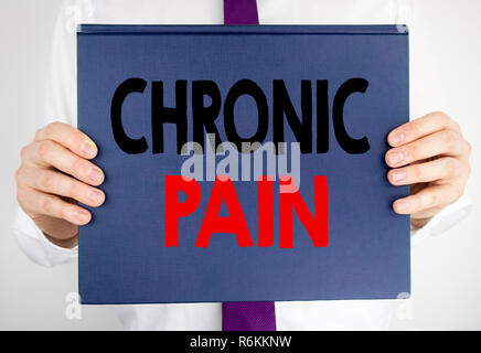 Doctor holding a book on blurred background Stock Photo - Alamy