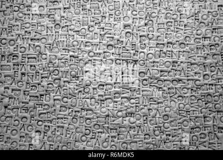 Old letterpress blocks background. Imprinted in modeling clay Stock ...