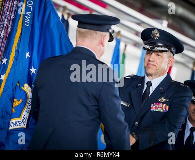 Maj. Gen. Evan Dertien, Air Force Test Center, presents Brig. Gen ...