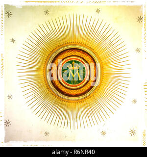 Monogram of the Blessed Virgin Mary, with crown, sun and stars on the ...