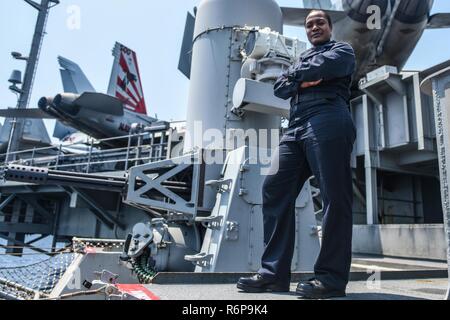 US Navy Fire Controlmen stationed aboard the Nimitz class aircraft ...