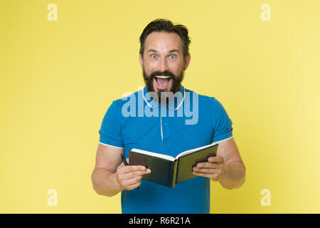 mature man inspired with idea hold book or notebook for education ...