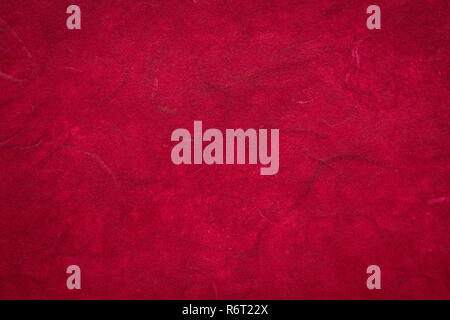 background of dark red textured handmade mulberry paper, panoramic web ...