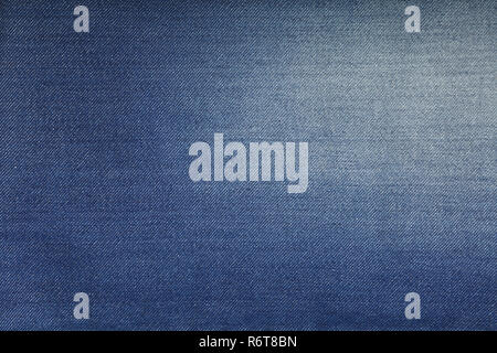 Light blue washed faded denim fabric texture swatch Stock Photo - Alamy