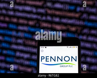 The Pennon Group logo is seen on an LED screen in the background while ...