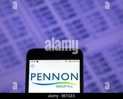 The Pennon Group logo is seen on an LED screen in the background while ...
