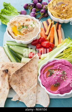 different varieties of hummus Stock Photo - Alamy