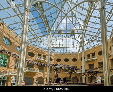Visitors walk past the Great Hall of the People on Tiananmen Square in ...