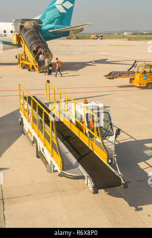Ground handling equipment including luggage loader vehicles at Verona ...