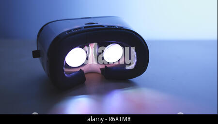 VR device playing movie inside at night Stock Photo - Alamy