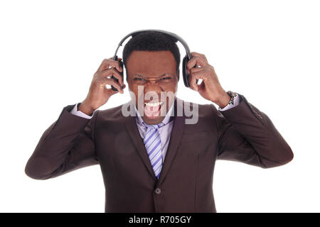 Business man listening to noisy music Stock Photo - Alamy