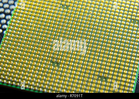 Computer processor, contact feet. Electronic board with electrical ...