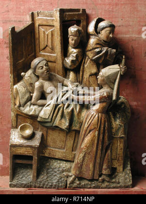 Sculpture of the devil and St Anthony of Padua at grotto in the village ...