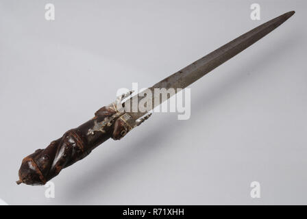 A bronze dagger with blade-shaped blade and hilt, weapon, metal, bronze ...