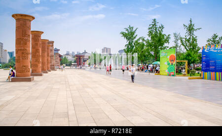 Local people and tourists walkin in Dayan Pagoda Square. Xian, China ...