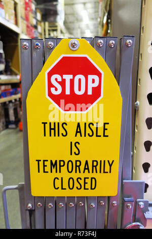 A folded up aisle blocker Stock Photo - Alamy