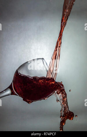 Interesting way for pouring and splashing wine in a glass Stock Photo ...