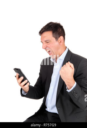 Closeup of a man shouting into his cellphone Stock Photo - Alamy