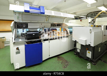 Compact disc and DVD manufacturing machine Stock Photo - Alamy