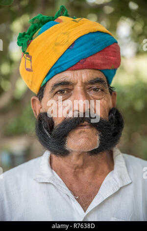 Indian man with fantastic mustache and turban at Meherangarh Fort ...