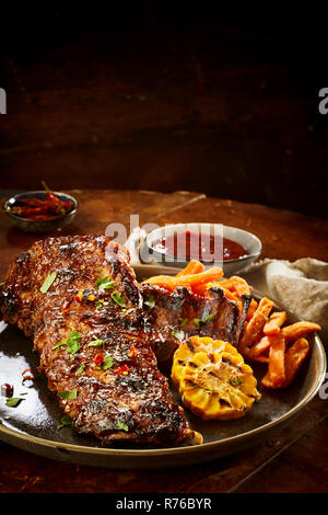 Marinated sauce meat beef with deep fried and white sesame serve with ...