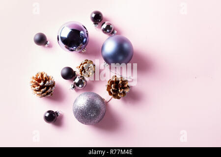 Gray Christmas decorations on pink Stock Photo - Alamy