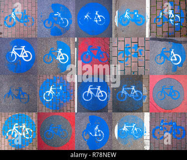 Collage of cycle track markings on a pavement, partly worn away Stock ...