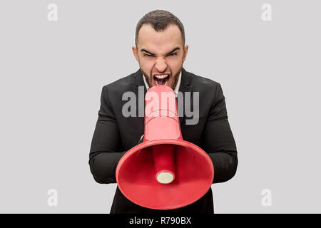 emotional businessman screaming into megaphone isolated on white Stock ...