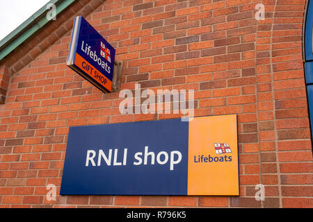 RNLI shop sign Stock Photo - Alamy