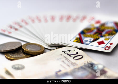 Gambling Poker Cards and Money Coins Photo Stock Photo - Alamy