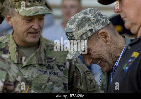 Retired Lt. Gen. David E. Grange converses with Gen. Daniel B. Allyn ...