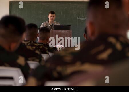 U.S. Army Capt. Kevin Nigh discusses disaster preparedness with ...