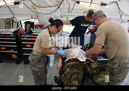 U.S. Air Force 1st Lts. Andrew Crispin and Emily Barkemeyer, C-17 ...