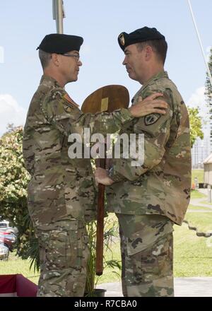 U.S. Army Col. Daniel Whitney and Maj. Erin Whitney speak to Jack Hiray ...