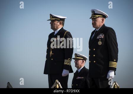 Capt. Mike MacNicholl, right, commanding officer of Naval Station Rota ...