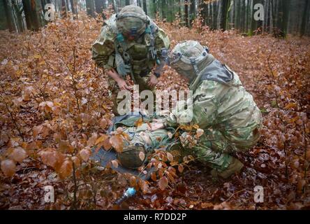 U.S. Army Sgt. Carmen Palmer and Spc. Tanner Hurst assigned to the 1st ...
