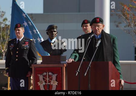 Retired Army Col. Roger H. C. Donlon, right, kisses his wife, Norma, at ...