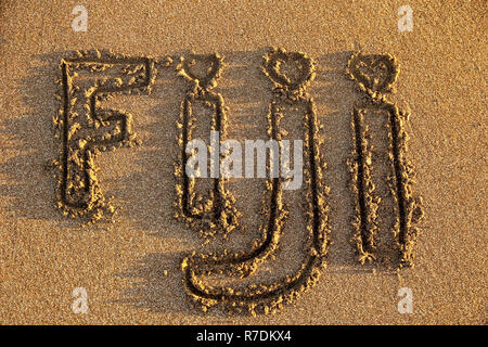 Word Fiji written on a beach - travel concept Stock Photo - Alamy