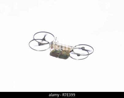 A joint tactical autonomous air resupply systems (JTAARS) carries a ...