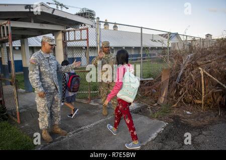 Guam Army National Guardsmen Pfc. Ryan Jimmy and Spc. Tristan Cruz ...