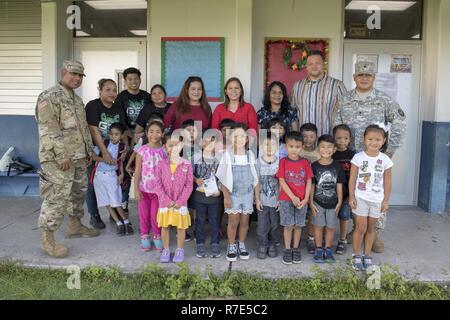 Guam Army National Guardsmen Pfc. Ryan Jimmy and Spc. Tristan Cruz ...