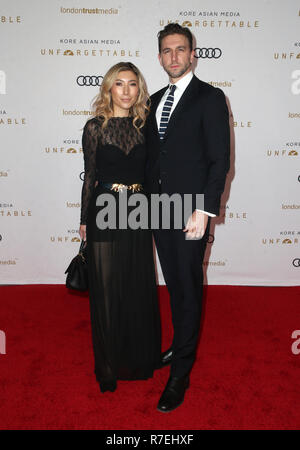 BEVERLY HILLS, CA - DECEMBER 8: Dichen Lachman, Maximilian Osinski, at ...