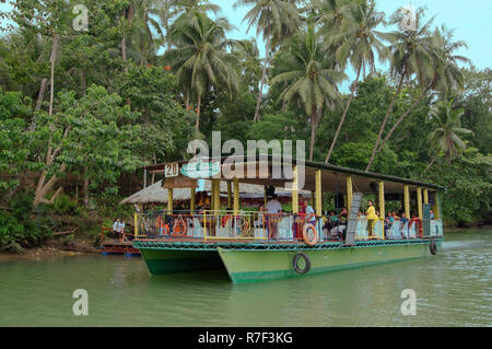Cruise ship on the Loboc River is a river in the Bohol province of the ...