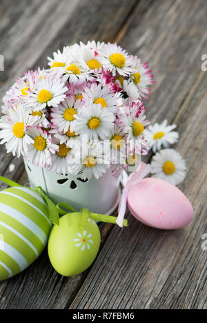 Daisy flowers with easter eggs Stock Photo - Alamy