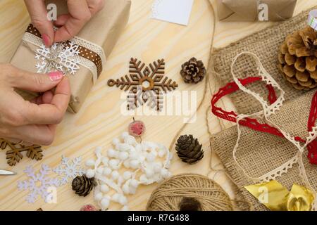 scrapbook background. christmas - girl packs gift Stock Photo - Alamy