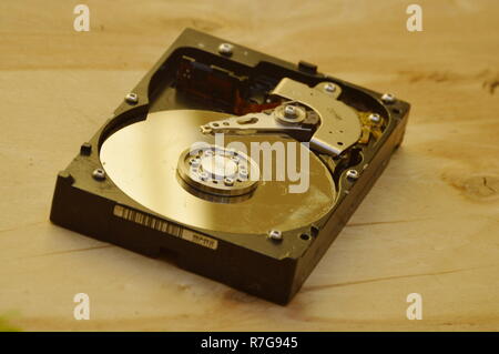 PC Hard Disc on wooden table Stock Photo - Alamy