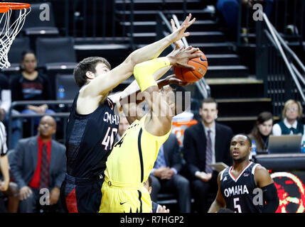 Omaha forward Matt Pile (40) sets a pick to stop Colorado guard ...