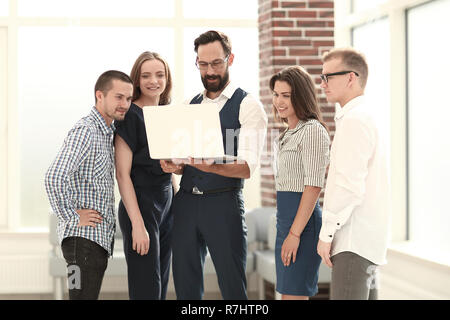 employees of the business center looking at the monitor Stock Photo - Alamy